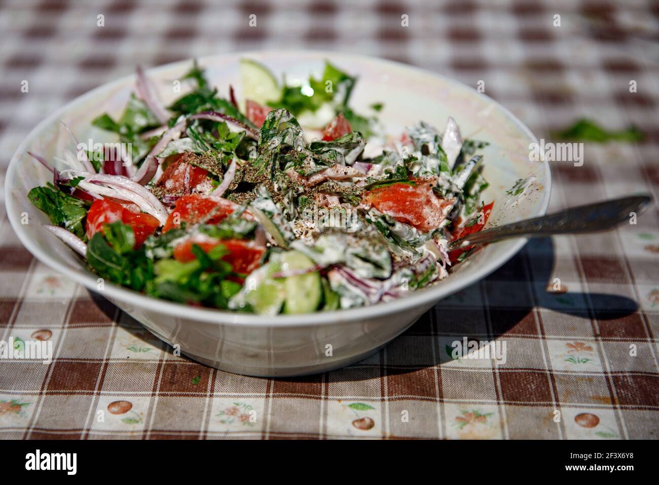 Rustic vegetable salad with cucumber and tomatoes Stock Photo - Alamy