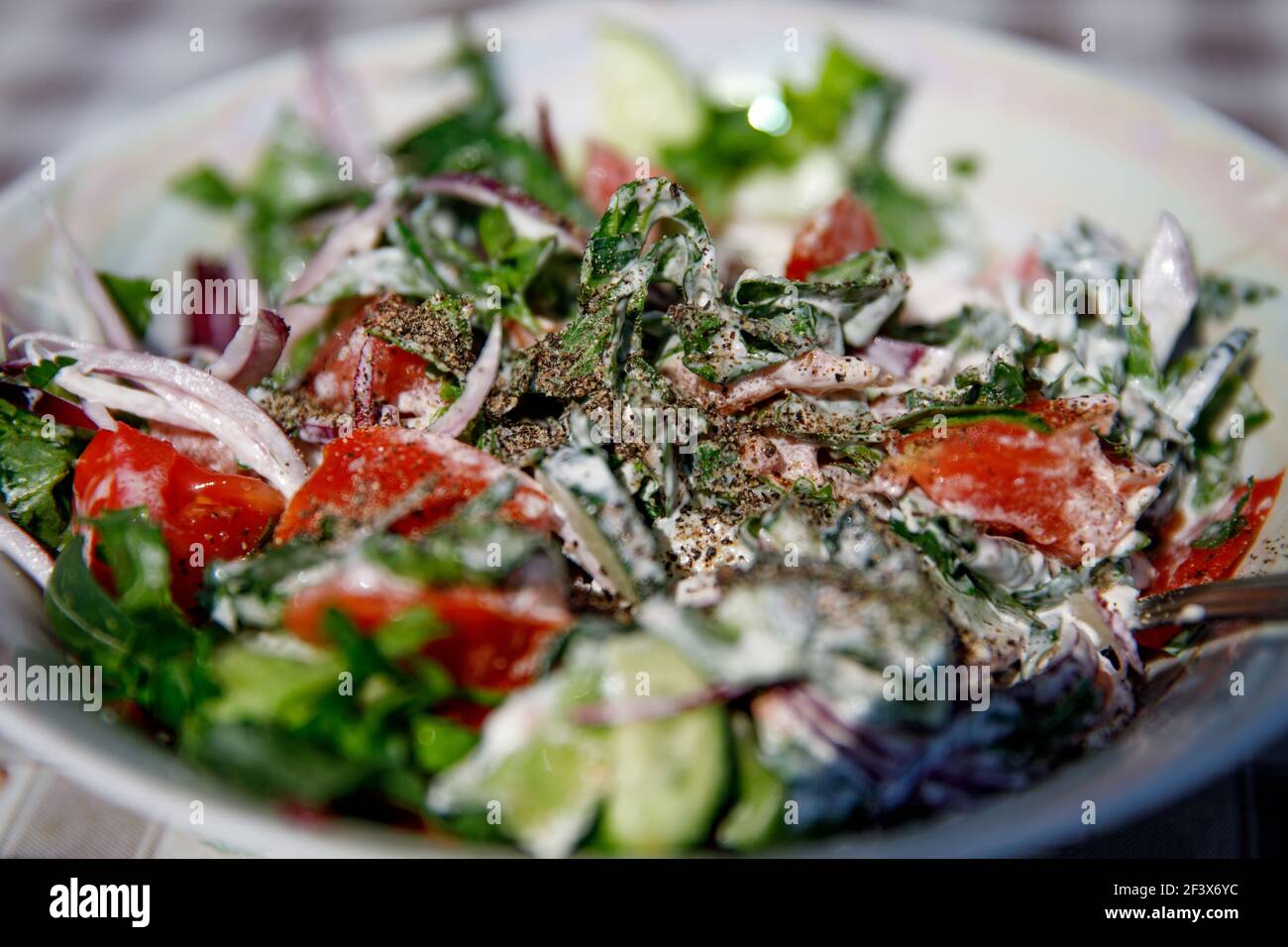 Rustic vegetable salad with cucumber and tomatoes Stock Photo - Alamy
