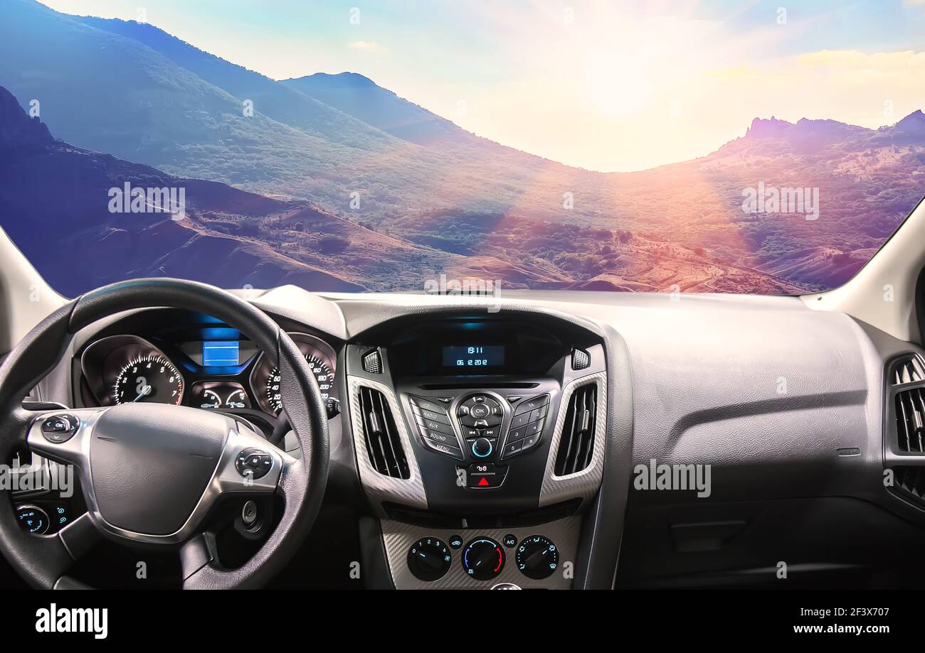 view of the beautiful mountain scenery from the car through the ...