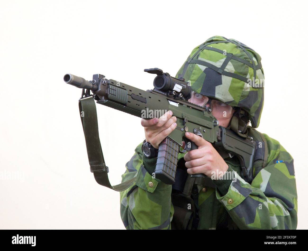 A soldier, with Automatic Carbine 5C (Ak 5C), in the Swedish Armed ...