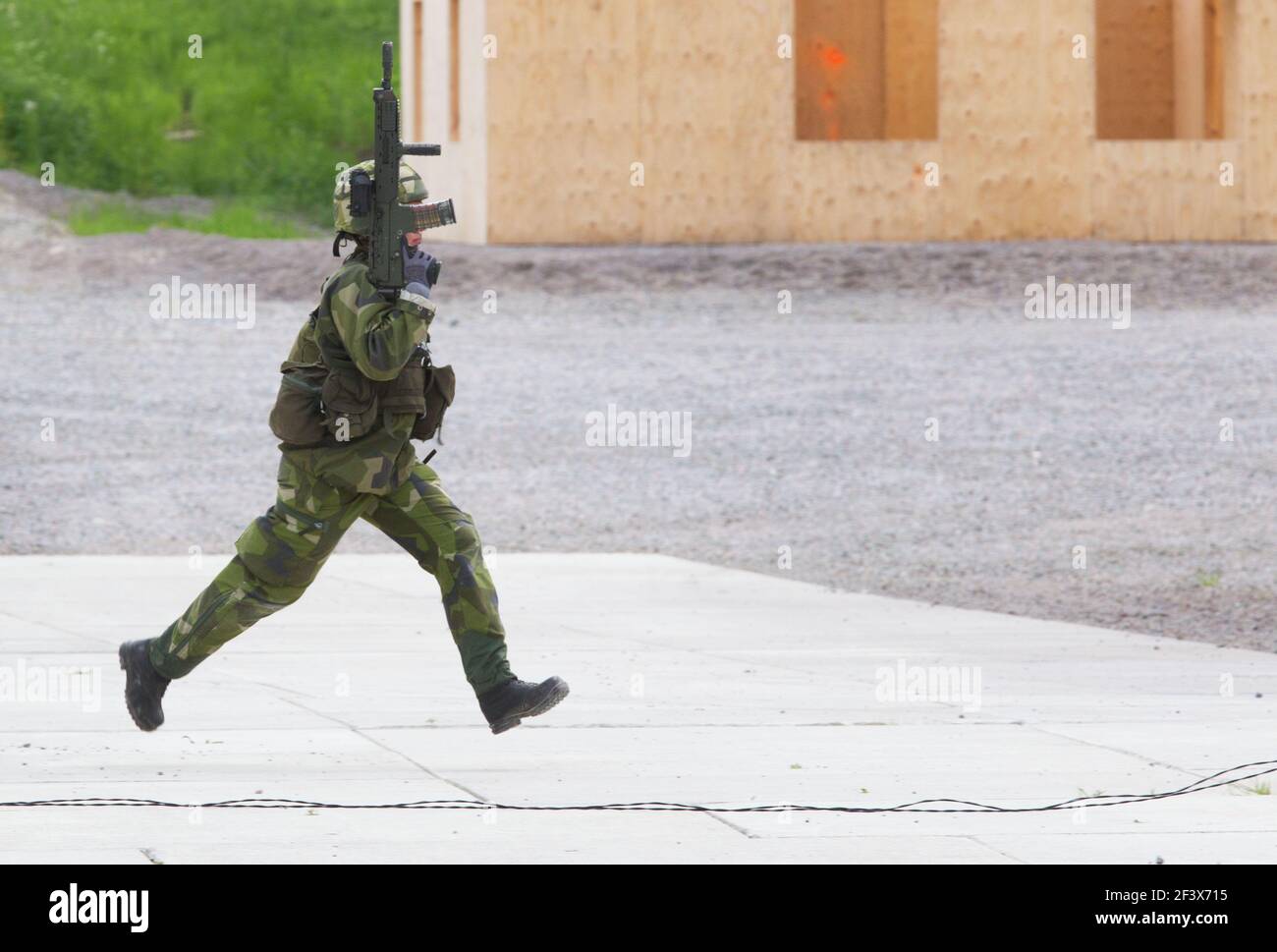 A soldier, with Automatic Carbine 5C (Ak 5C), in the Swedish Armed ...