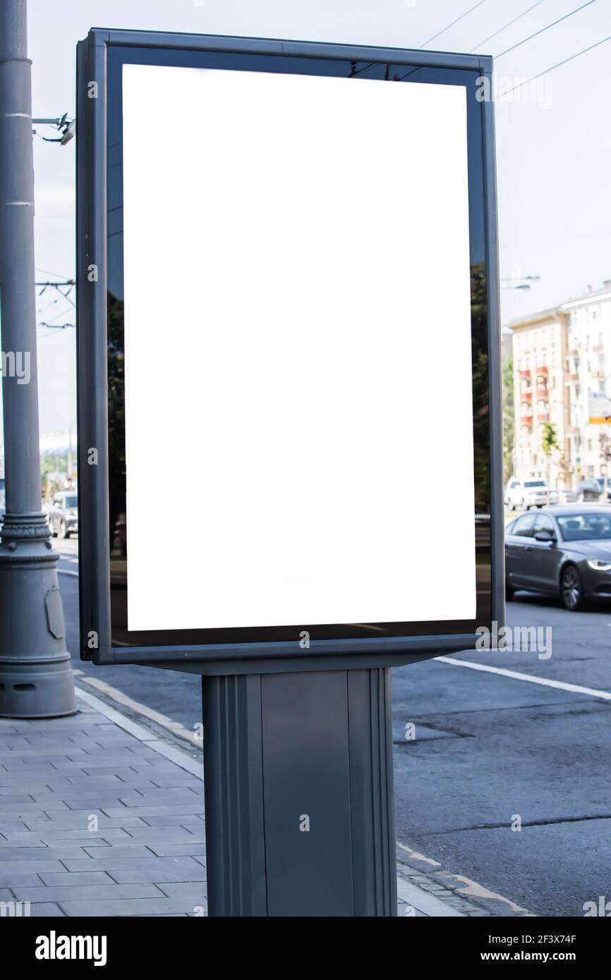 Outdoor advertising stand on sidewalk in city. White background. Place ...