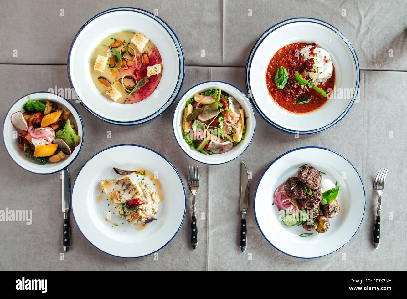 Mediterranean cuisine dishes on the served table Stock Photo - Alamy