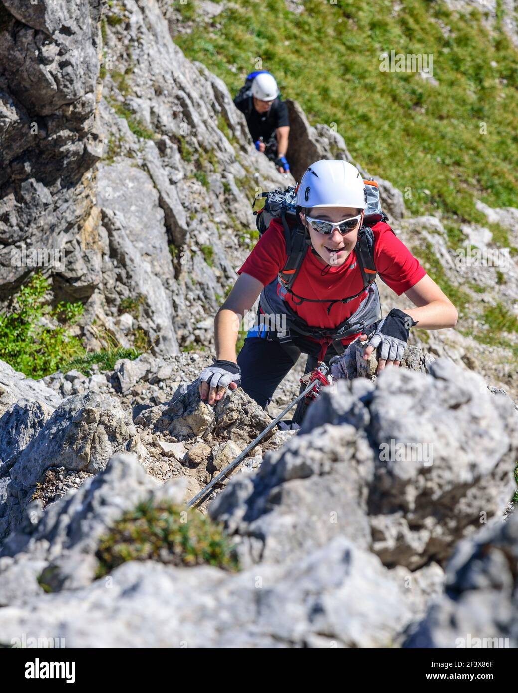 Via Ferrata climbing in high alpine region Stock Photo - Alamy