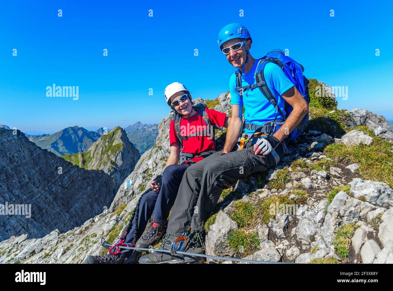 Via Ferrata climbing in high alpine region Stock Photo - Alamy