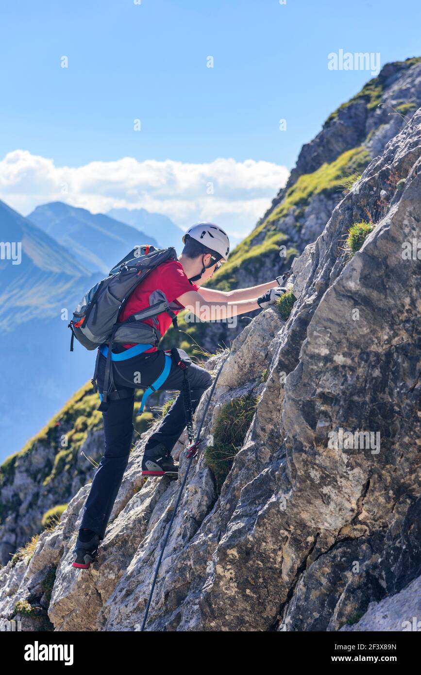 Via Ferrata climbing in high alpine region Stock Photo - Alamy