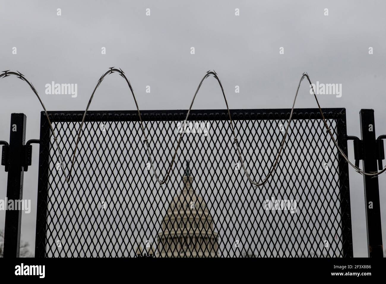 The iron, barbed wire-topped barrier fence still surrounds the U.S ...