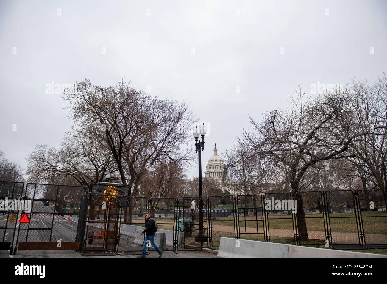 The iron, barbed wire-topped barrier fence still surrounds the U.S ...