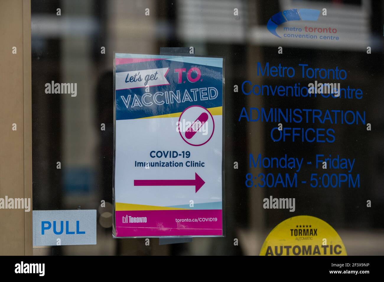Signage outside Metro Convention Centre directing people to Vaccination ...