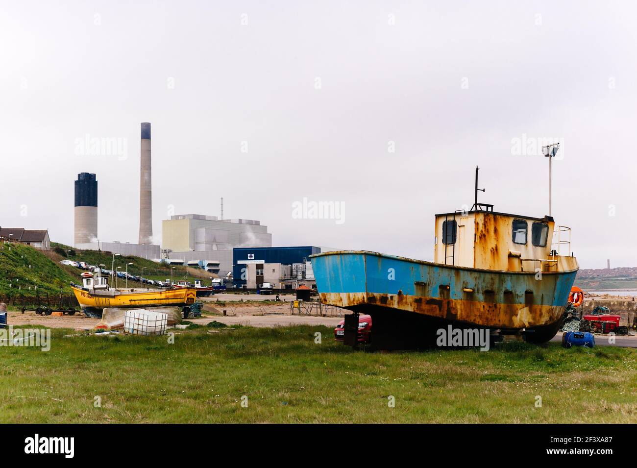 Photograph of the small fishing port of Boddam with a rusty old fishing ...
