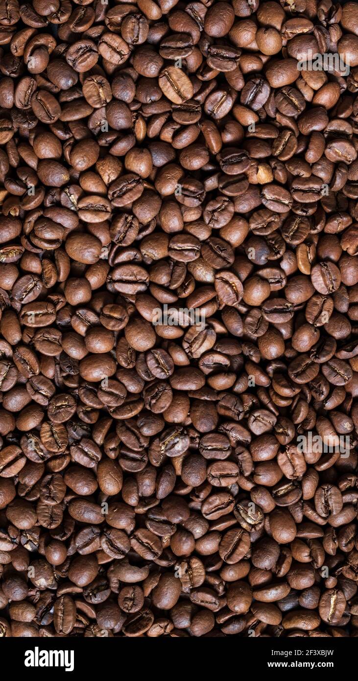 colombian roasted coffee beans background Stock Photo - Alamy