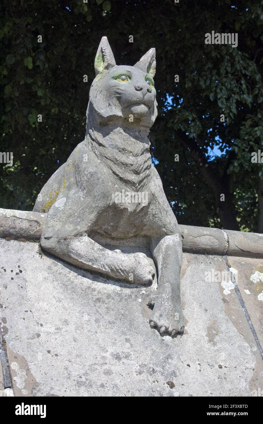 A lynx or wild cat resting on the famous Animal Wall of Cardiff Castle ...