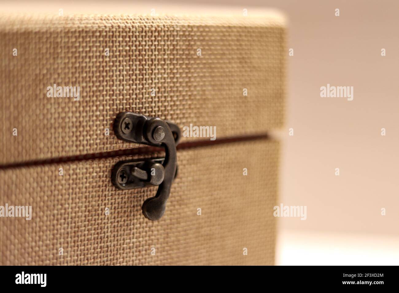 A closeup shot of a closed metal hook of a box Stock Photo - Alamy