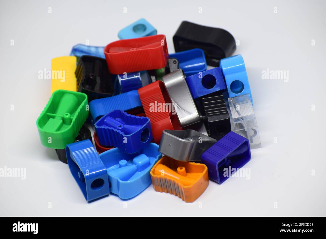 The colorful pencil sharpeners on a white background Stock Photo - Alamy