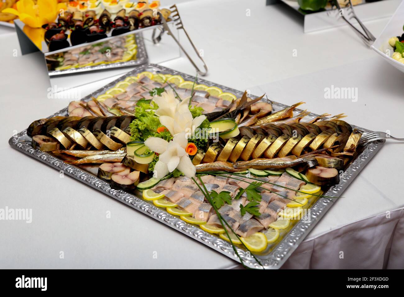 A serving of delicious boiled and fried assorted fishes Stock Photo - Alamy