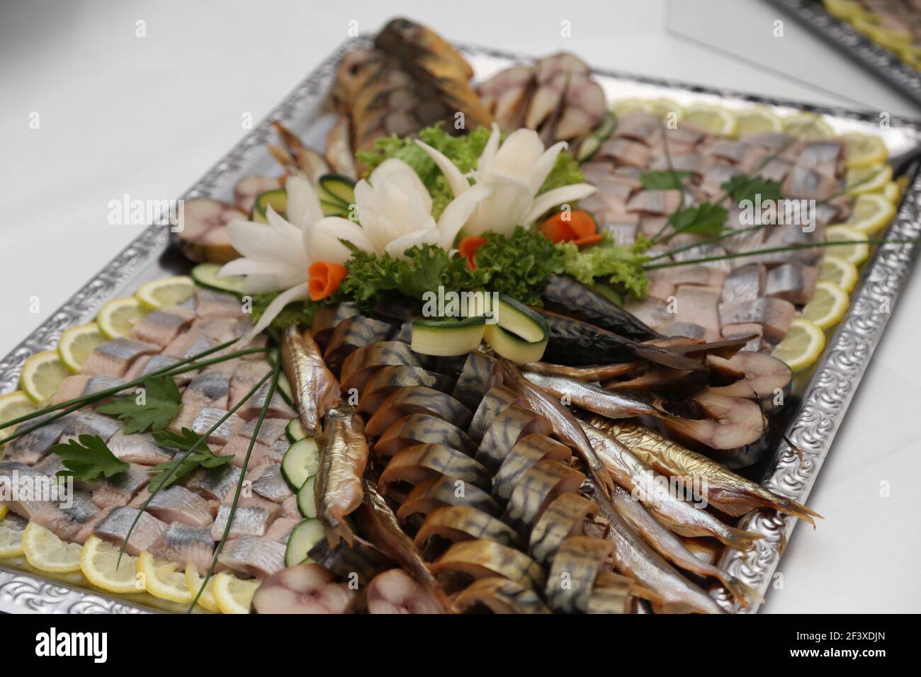 A serving of delicious boiled and fried assorted fishes Stock Photo - Alamy