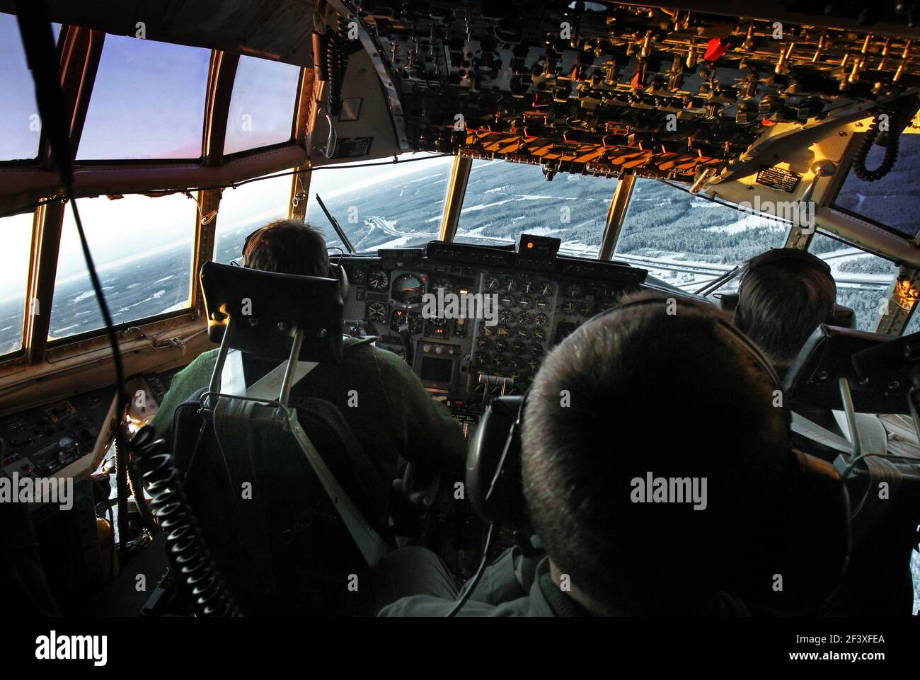 The flight crew in the cockpit of the Air Force's aircraft Hercules ...