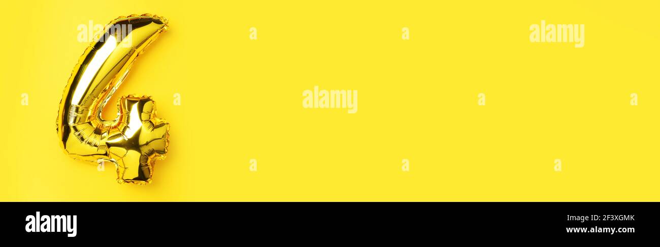 Creative layout. Golden foil balloon number and digit four 4. Birthday ...