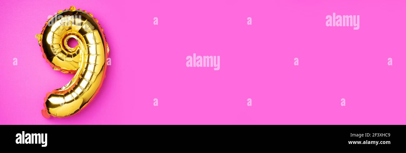 Creative layout. Golden foil balloon number and digit nine 9. Birthday ...