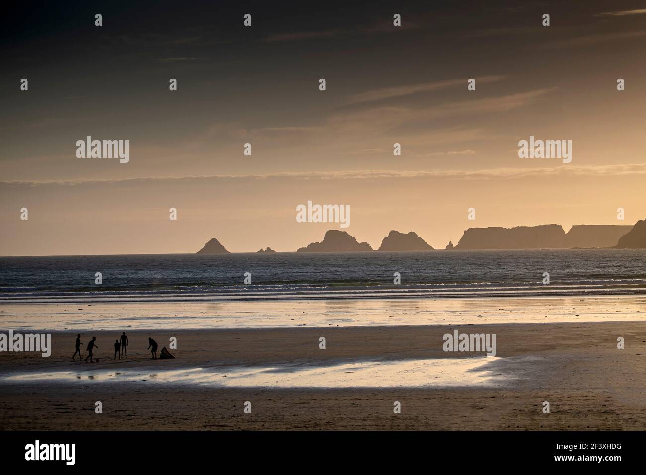 Lonely beach at sunset hi-res stock photography and images - Alamy