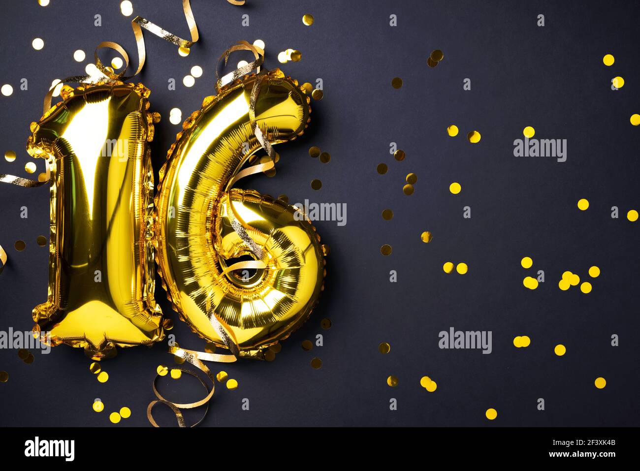Gold foil balloon number, digit sixteen. Birthday greeting card ...
