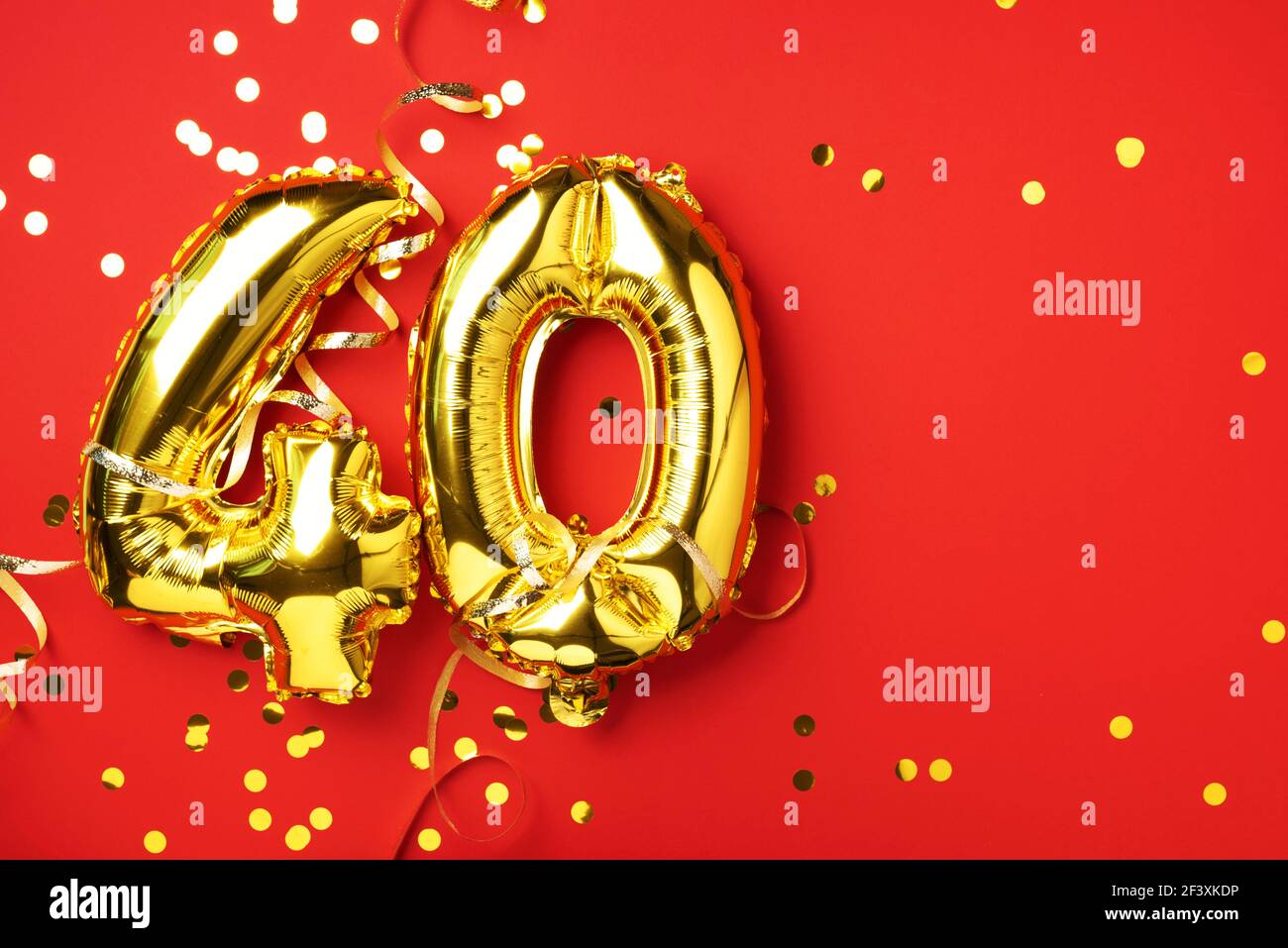 Gold foil balloon number, digit forty. Birthday greeting card with ...