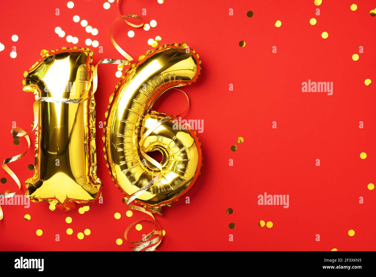 Gold foil balloon number, digit sixteen. Birthday greeting card ...