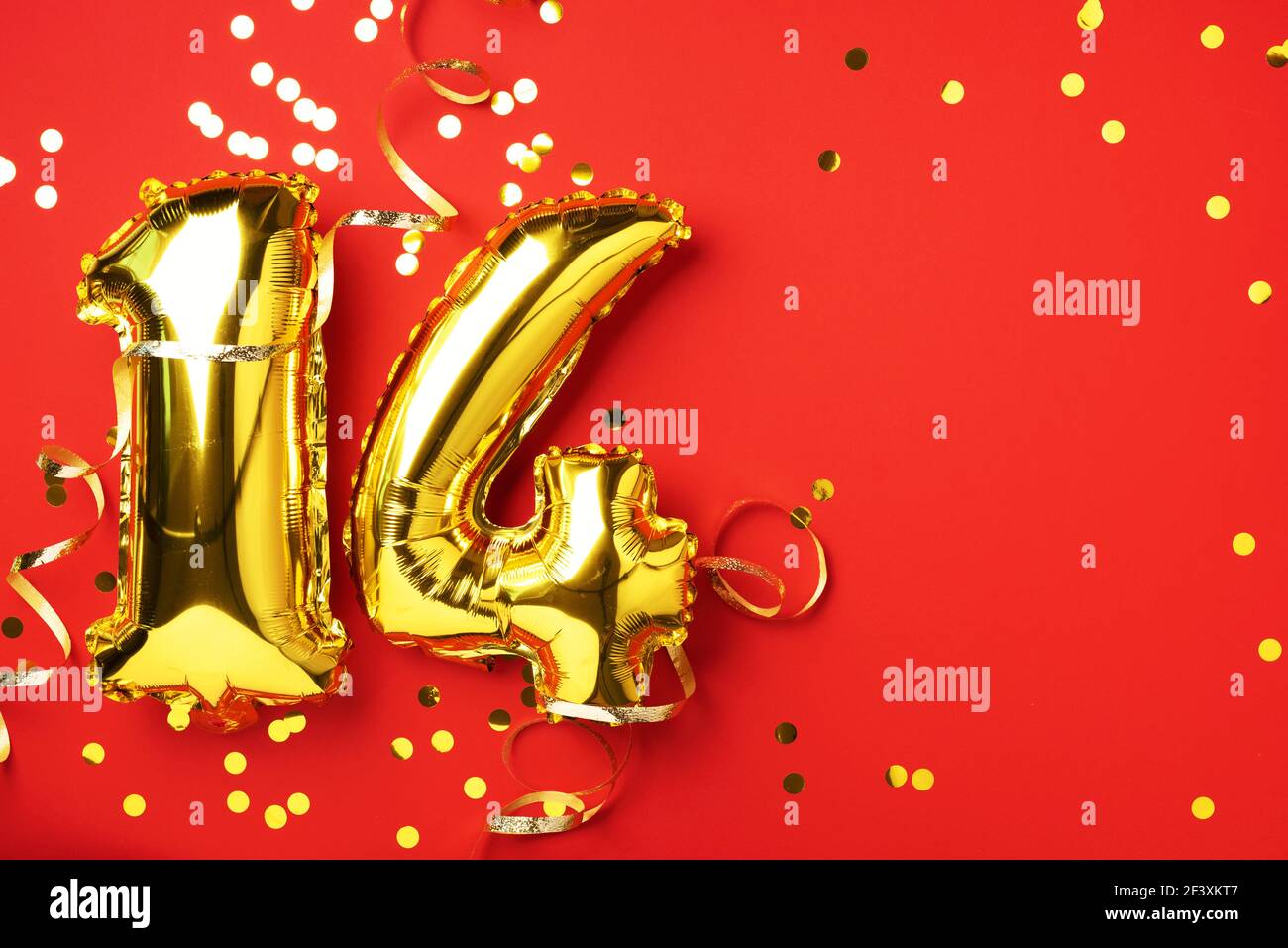 Gold foil balloon number, digit fourteen. Birthday greeting card ...