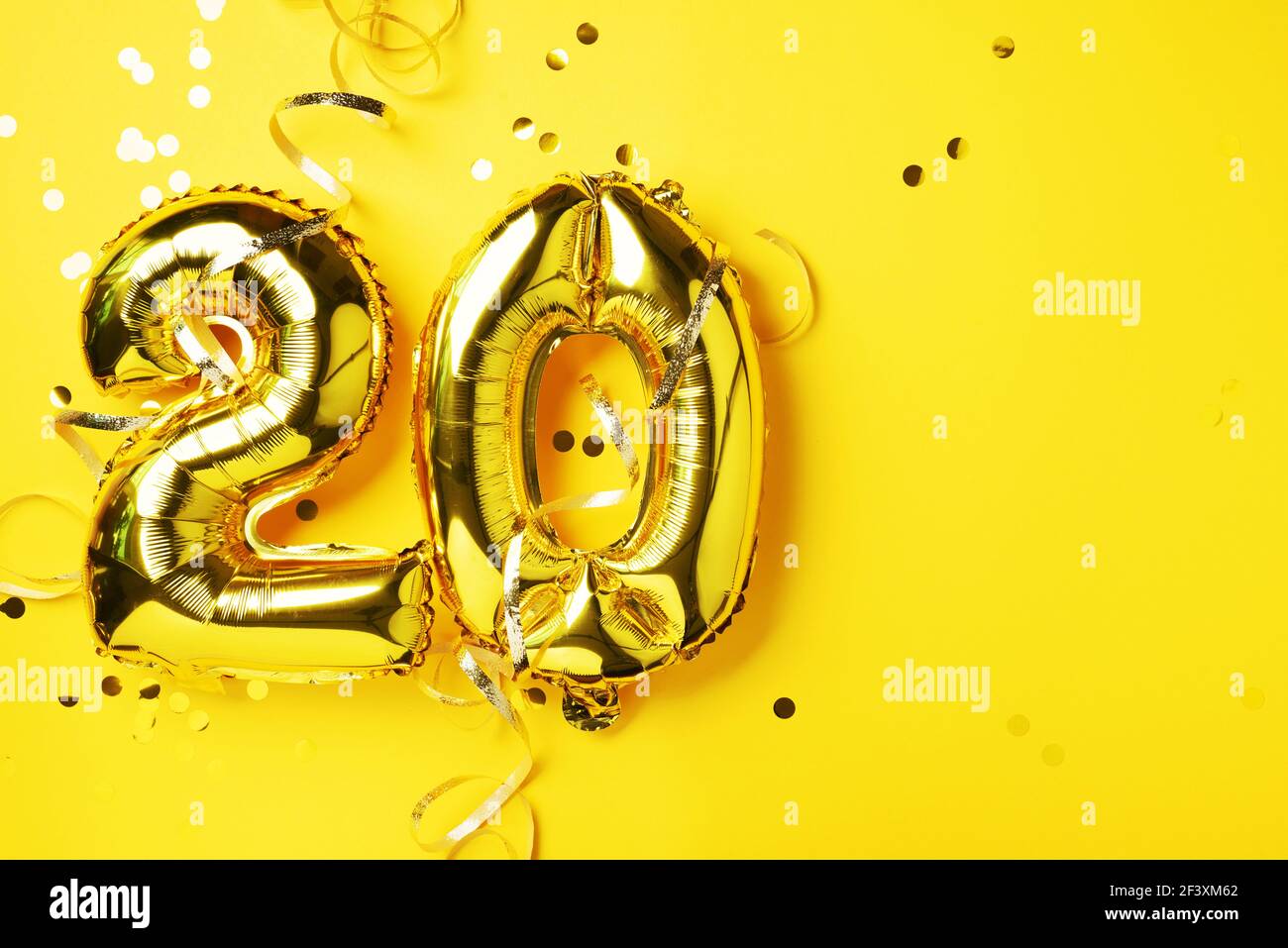 Gold foil balloon number, digit twenty. Birthday greeting card ...