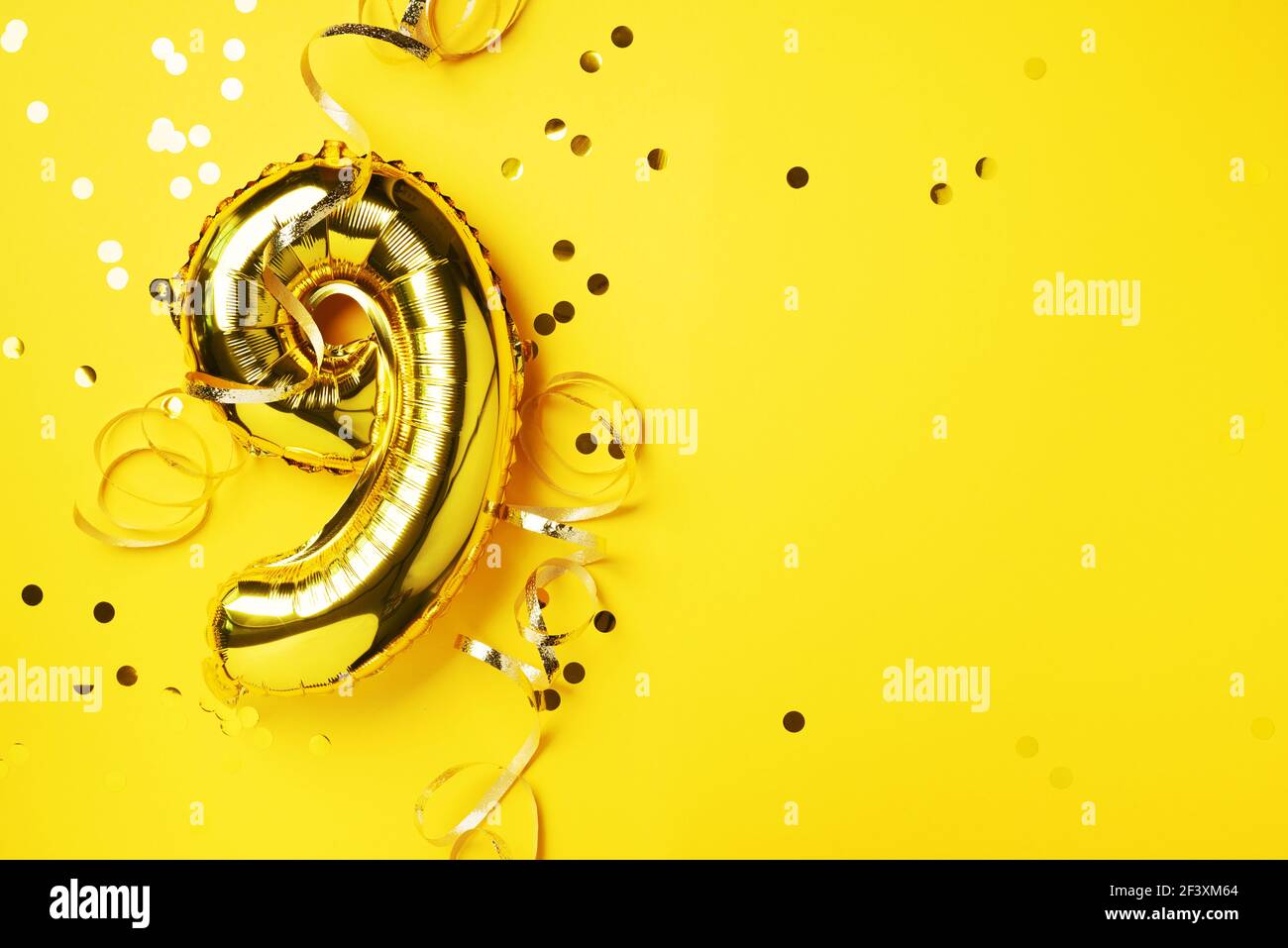 Gold foil balloon number and digit nine 9. Birthday greeting card. Anniversary celebration event ...