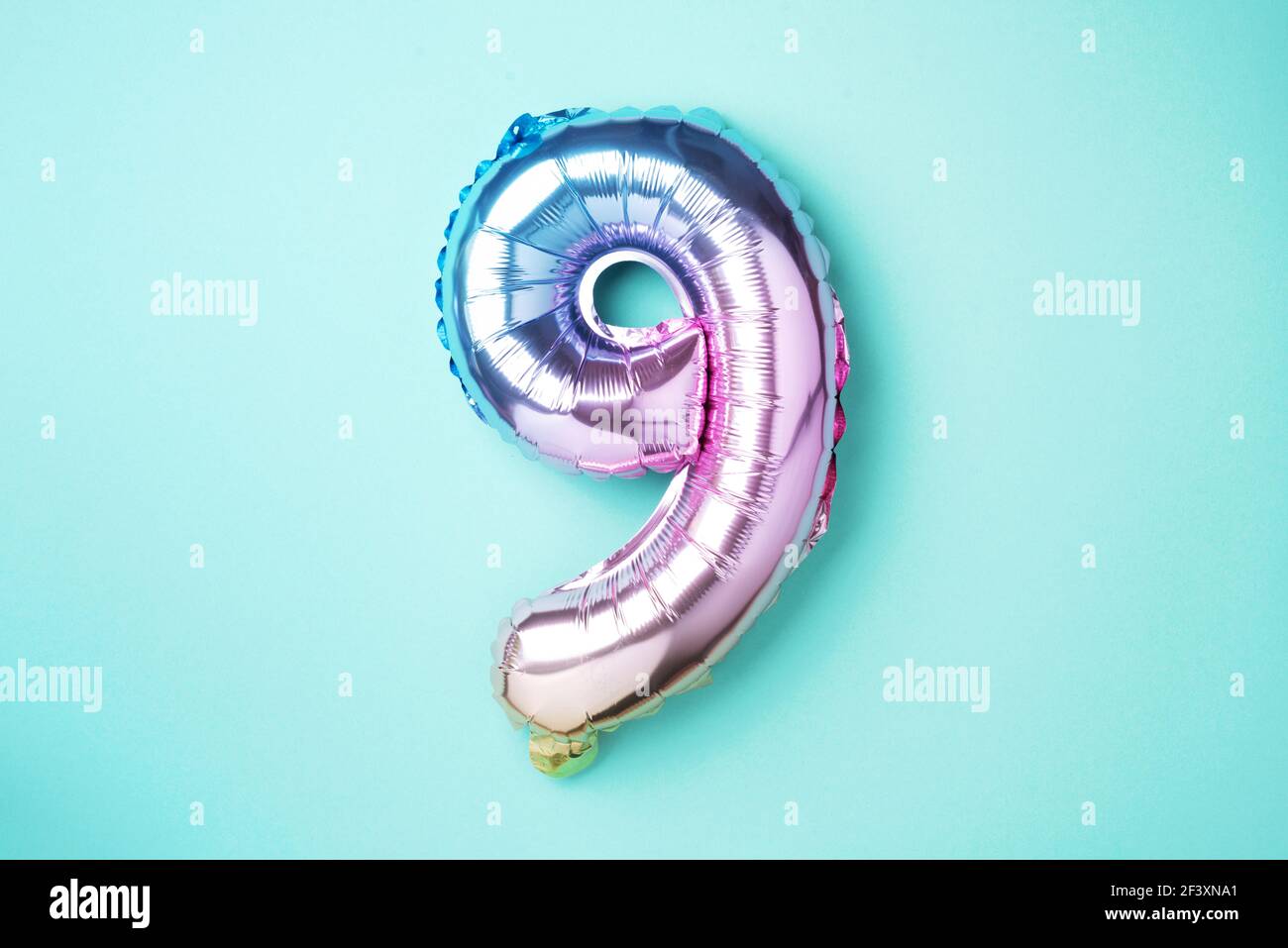 Creative layout. Rainbow foil balloon number and digit nine 9. Birthday ...