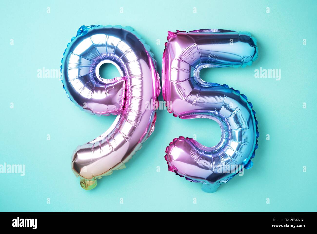 Rainbow foil balloon number, digit ninety-five. Birthday greeting card with inscription 95 ...