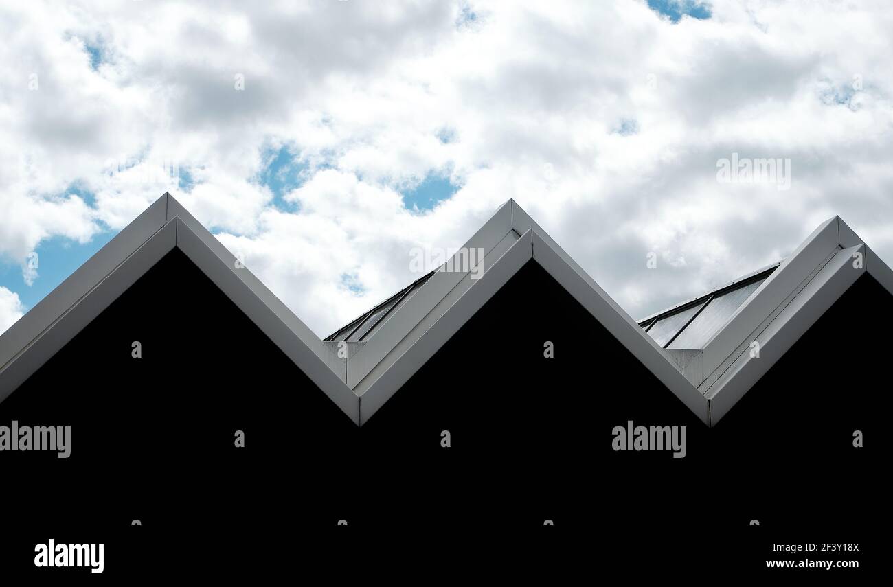 The three roofs with cloudy sky in the background Stock Photo - Alamy