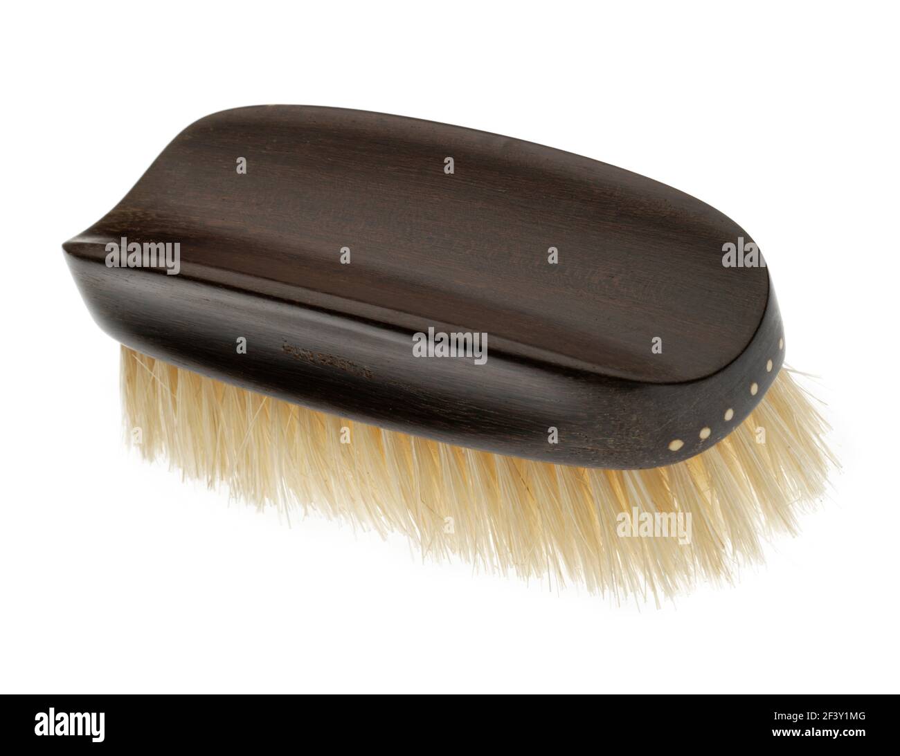 A wood and pure bristle clothes brush. Isolated cut out image on white ...
