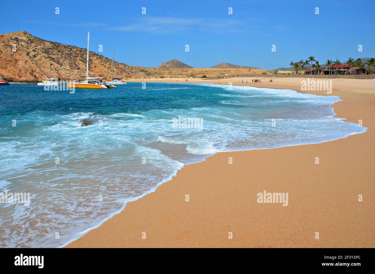 Sailing boats on the shoreline of Santa Maria a peaceful horseshoe ...