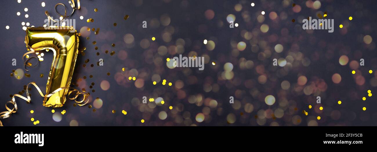 Gold foil balloon number and digit seven 7. Birthday greeting card ...