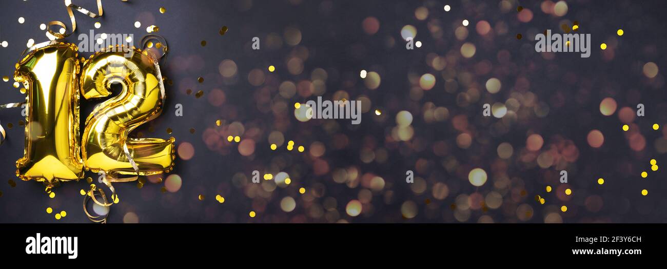 Gold foil balloon number, digit twelve. Birthday greeting card ...