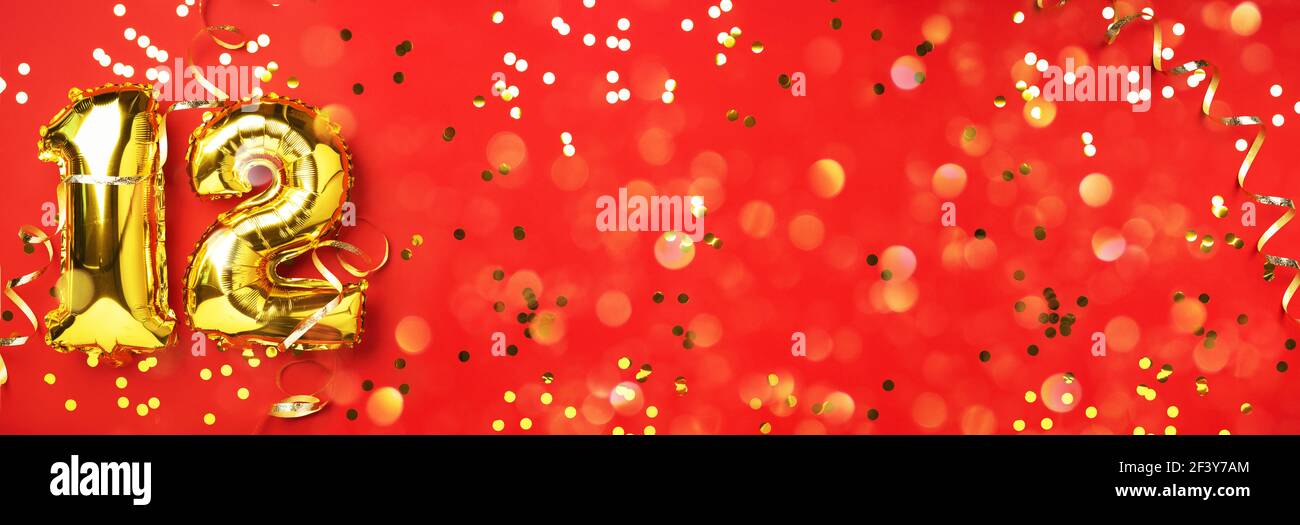 Gold foil balloon number, digit twelve. Birthday greeting card ...
