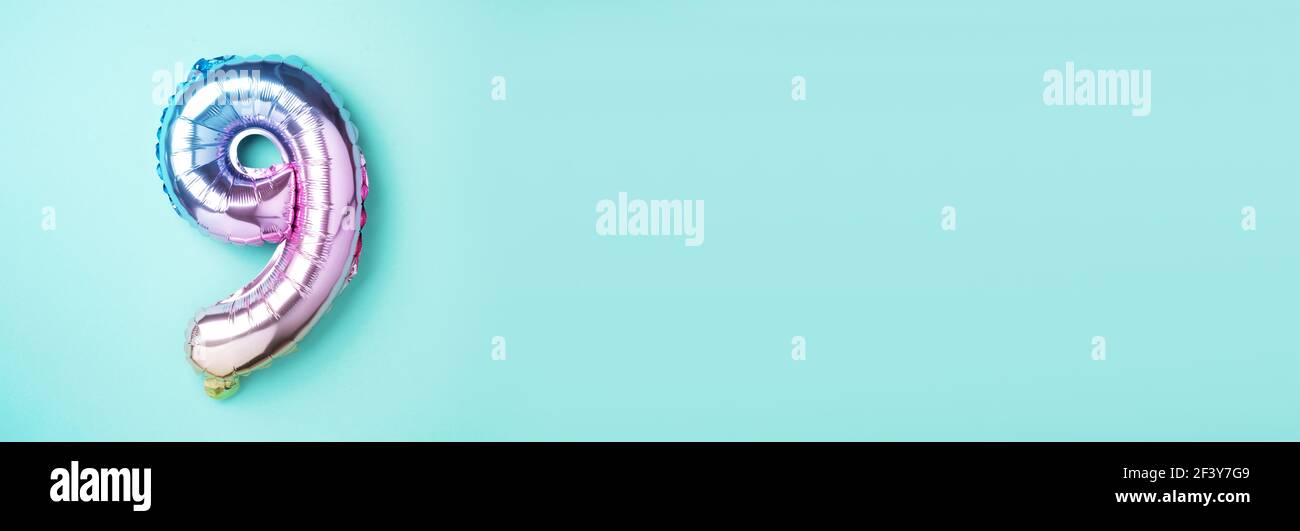 Creative layout. Rainbow foil balloon number and digit nine 9. Birthday ...