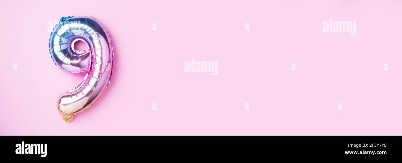 Creative layout. Rainbow foil balloon number and digit nine 9. Birthday ...