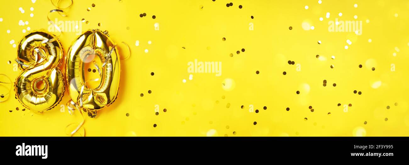 Gold foil balloon number, digit eighty. Birthday greeting card ...