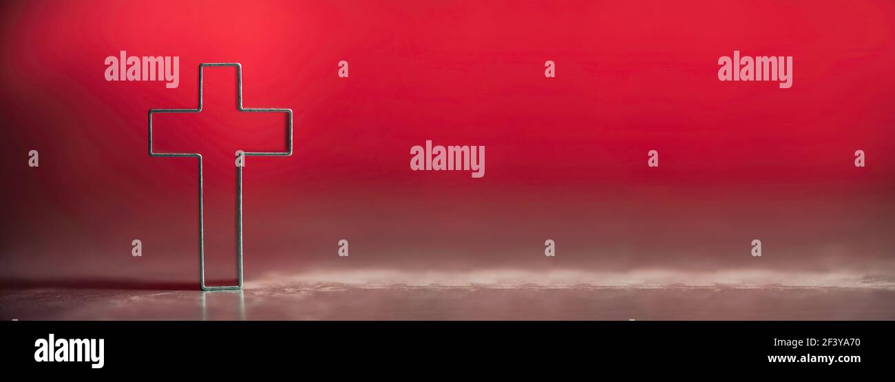 Christian cross on red background with soft bokeh lights background ...