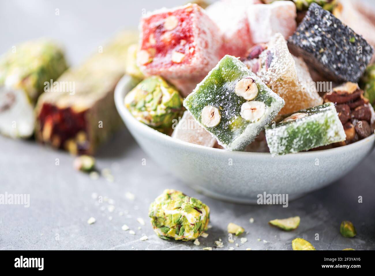 Traditional turkish delight on grey background. Arab dessert, baklava ...