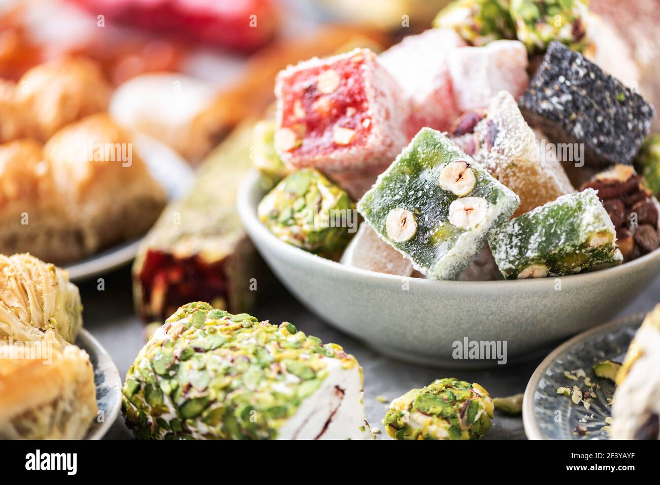 Traditional turkish delight on grey background. Arab dessert, baklava ...