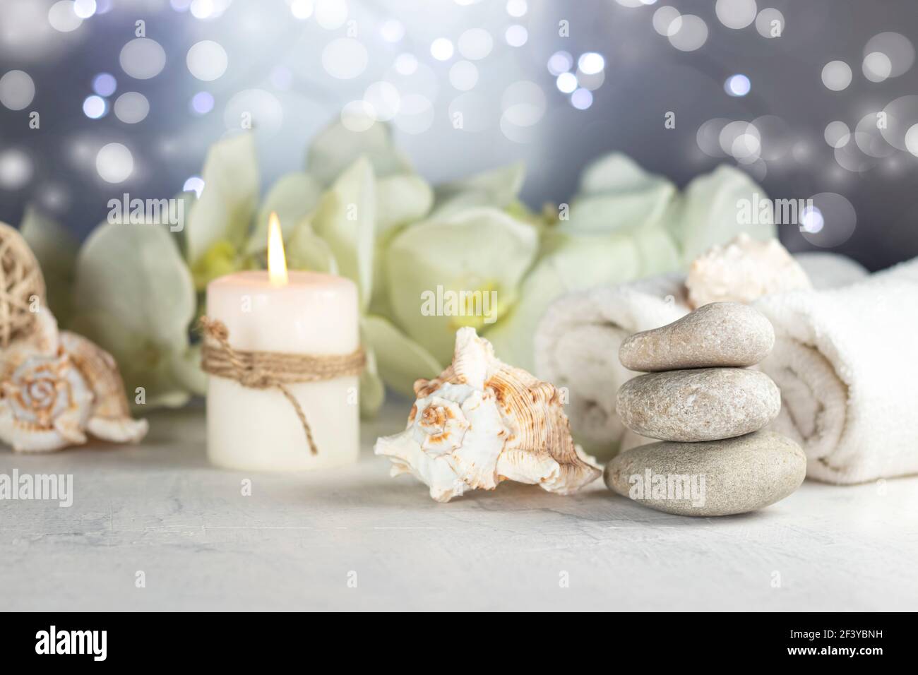 Massage Stones Seashell Burning Candles Rolled Towels Sea Salt
