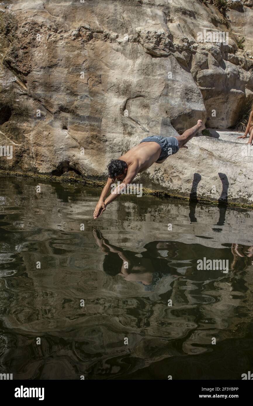 Man diving into pond hi-res stock photography and images - Alamy