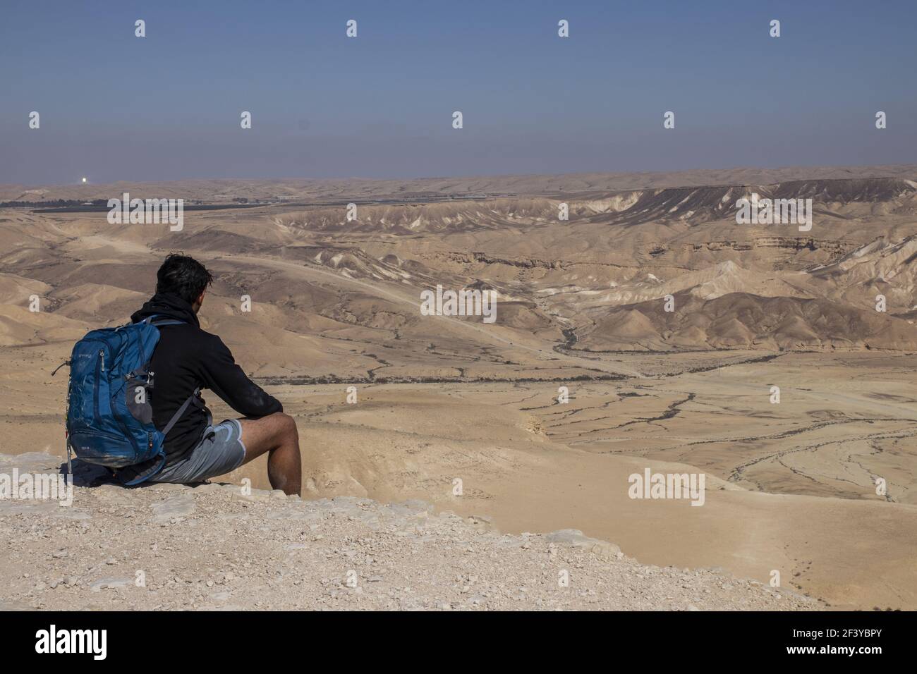 Man looking across desert landscape hi-res stock photography and images ...