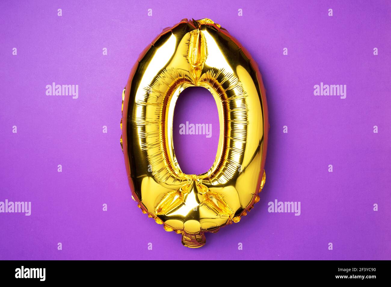 Creative layout. Golden foil balloon number zero 0. Birthday greeting ...