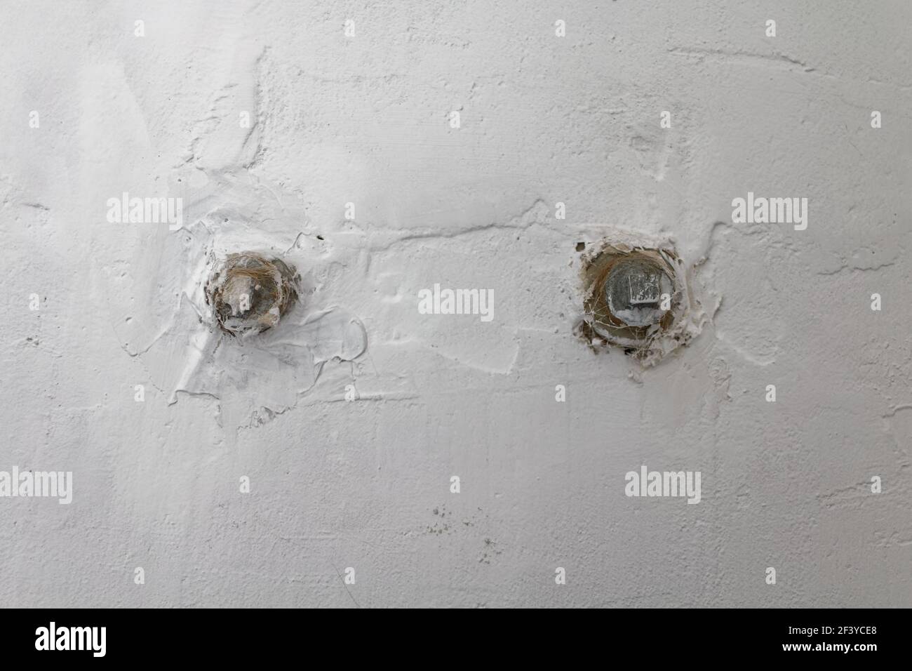 Water supply fittings on the wall Stock Photo - Alamy