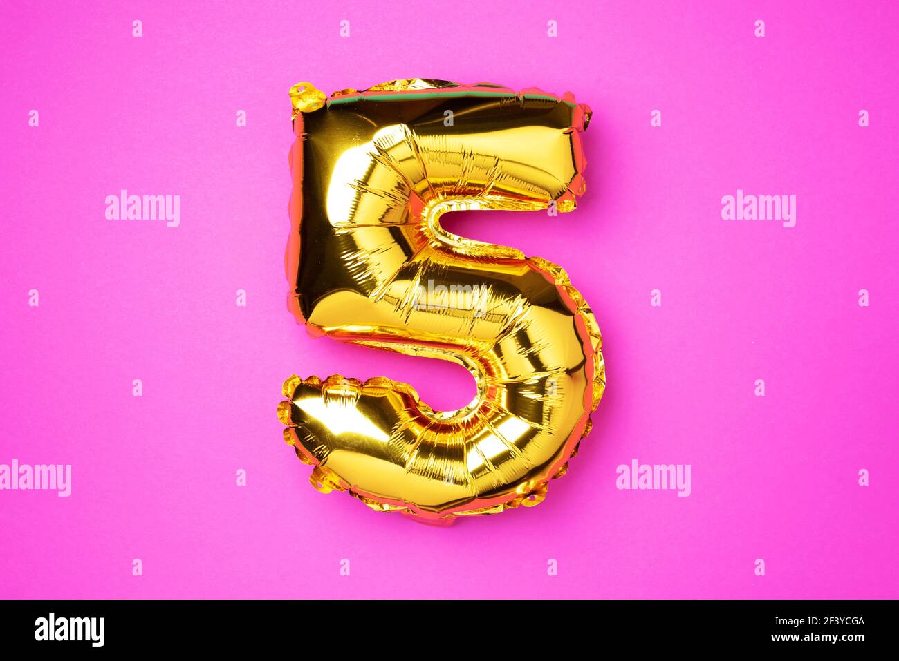 Creative layout. Golden foil balloon number and digit five 5. Birthday ...
